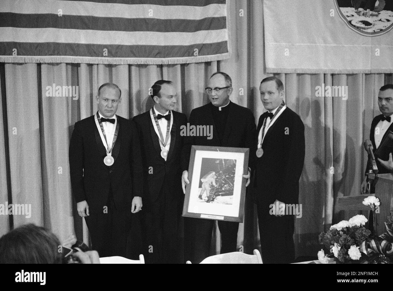 Marquette University President Rev. John Raynor poses with Apollo 11 ...