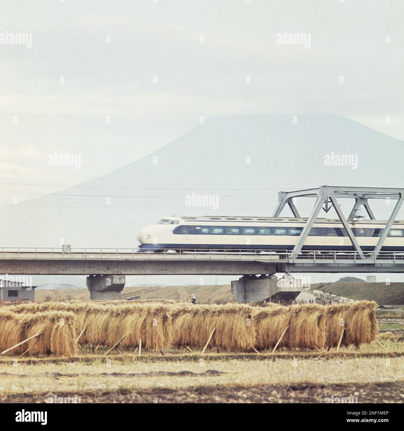 Shown in photo is an undated photo of Railroad train leaving Tokyo ...