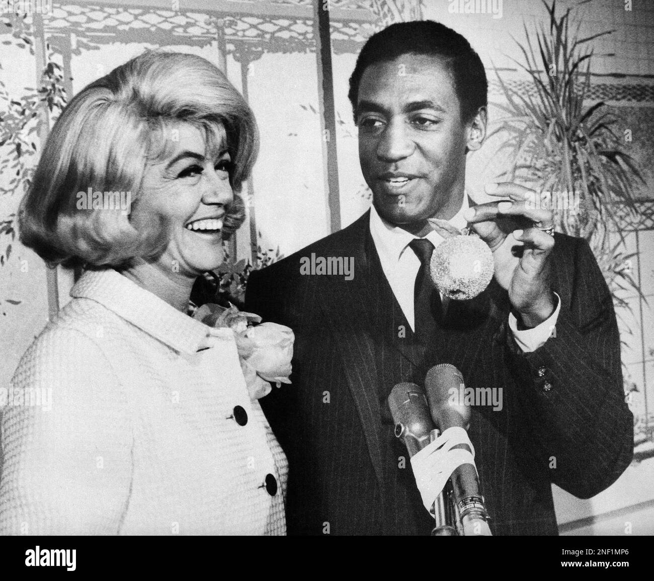 Bill Cosby, co-star of television’s “I Spy” series, holds a golden ...
