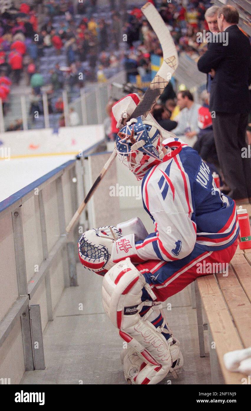 United States’ goalie Michael Dunham bangs his stick as he sits on the ...
