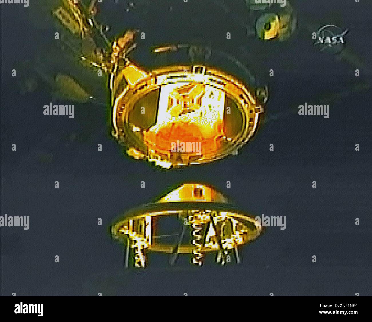 In this image rendered from video and released by NASA, space shuttle ...