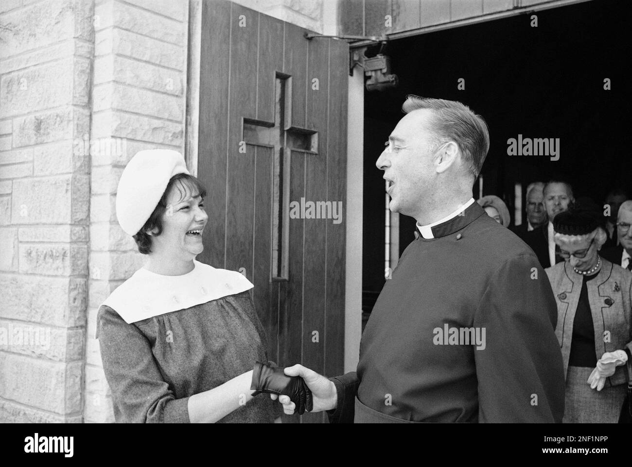 Mrs. James A. Lovell, wife of the pilot of Gemini 7, and her pastor ...
