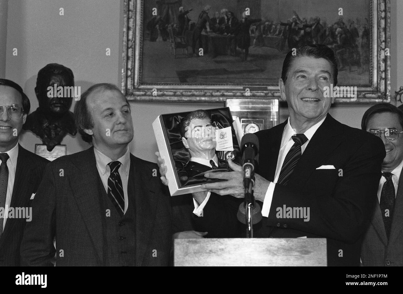 President Ronald Reagan holds up Royal Doulton President’s signature ...