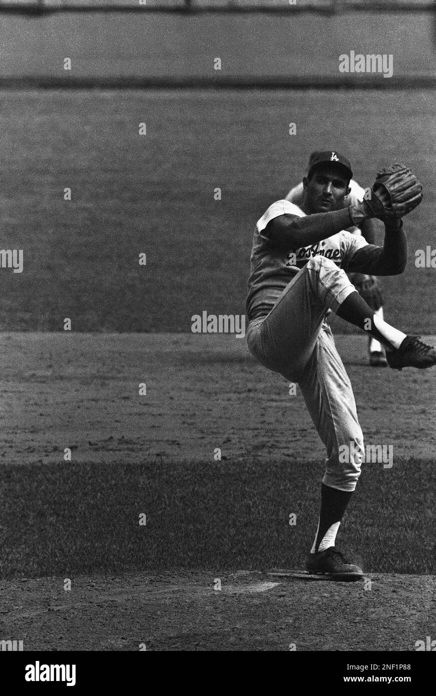 Sandy Koufax, pitcher for the Los Angeles Dodgers, is shown in action ...