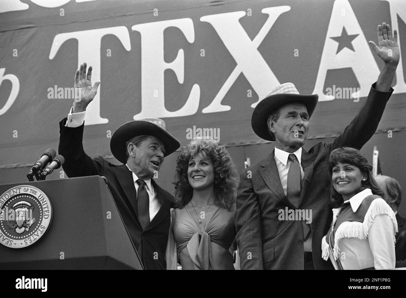 President Ronald Reagan, left, and Vice President George H. Bush don ...