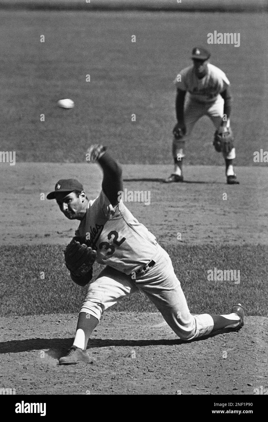 Sandy Koufax, pitcher for the Los Angeles Dodgers, is shown in action ...
