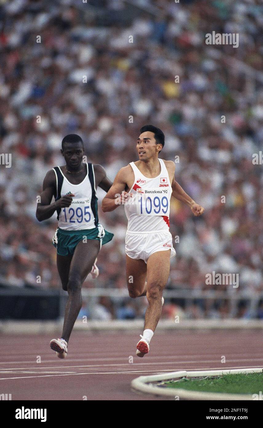 Japan’s Susumu Takano (right), finishes in fourth place, with Nigeria’s ...