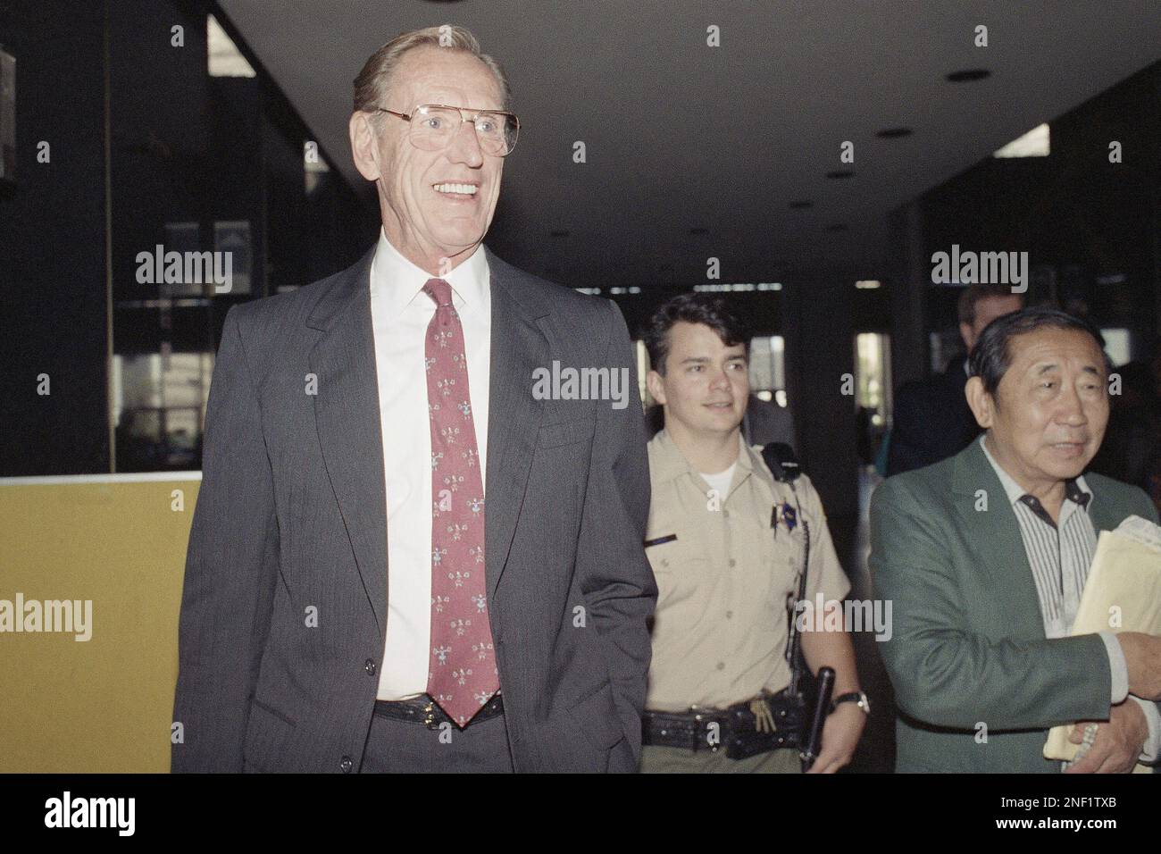 Former Lincoln Savings & Loan head Charles Keating is all smiles as he ...