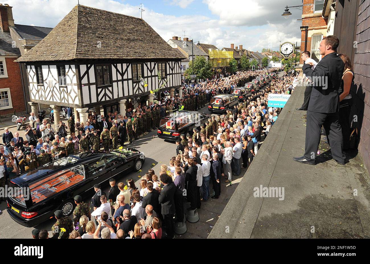 The cortege of hearses carrying the bodies of eight British soldiers ...