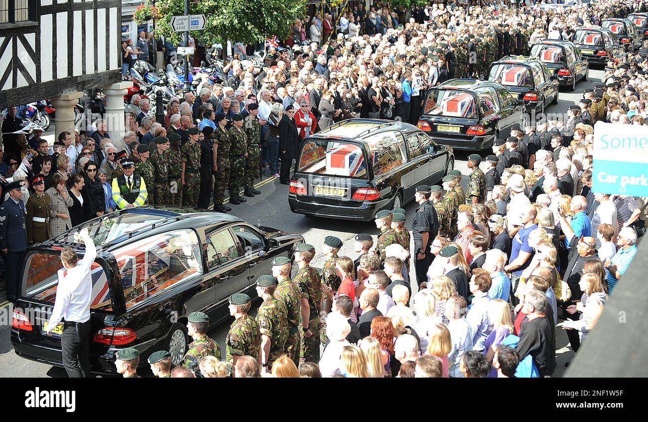 The cortege of hearses carrying the bodies of eight British soldiers ...