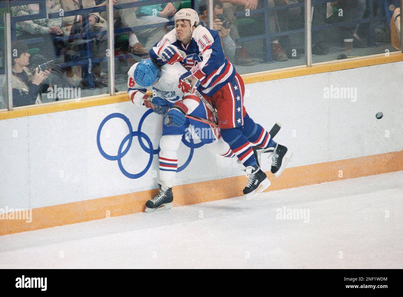 Todd Okerlund of the U.S., right, slams Norway’s Tor Eikeland against ...