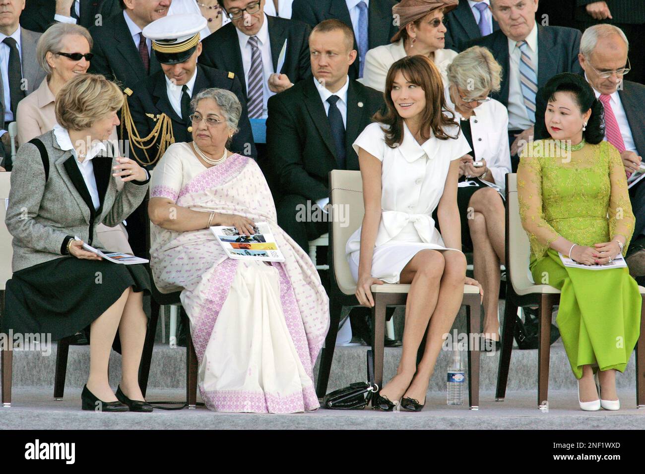From left, NATO Secretary General Jaap de Hoop Scheffer's wife ...