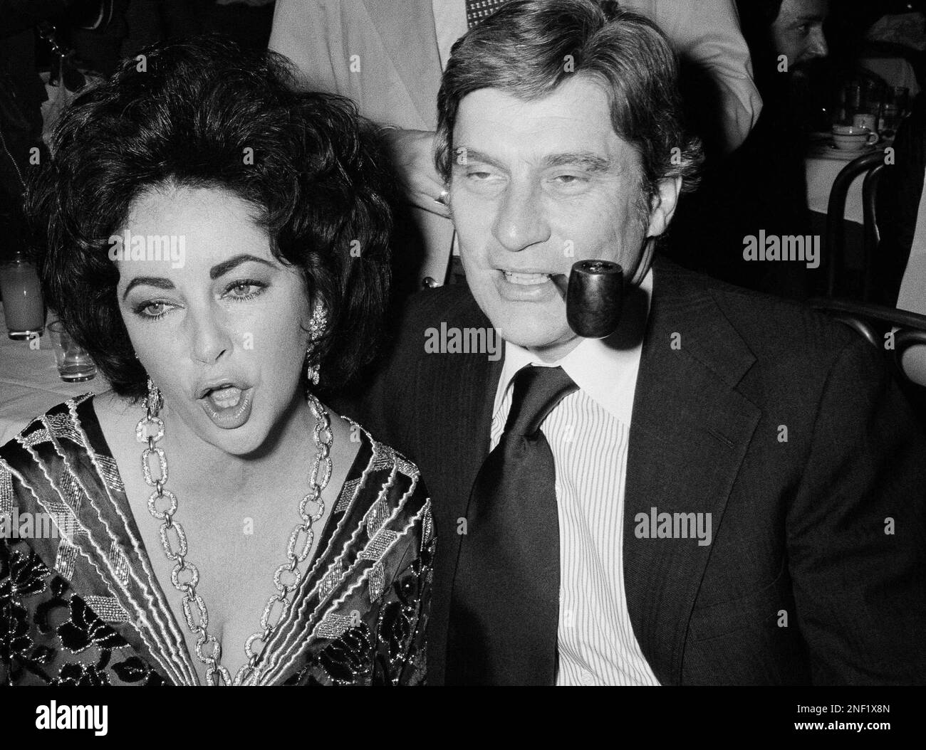 Elizabeth Taylor with husband John Warner at Sardis for the New York ...