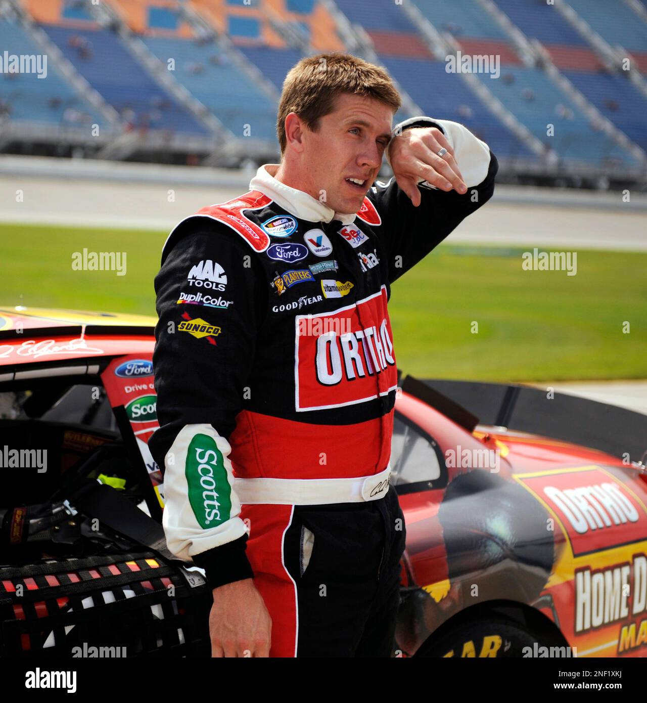 Carl Edwards gets out of his car after qualifying for the Nationwide ...