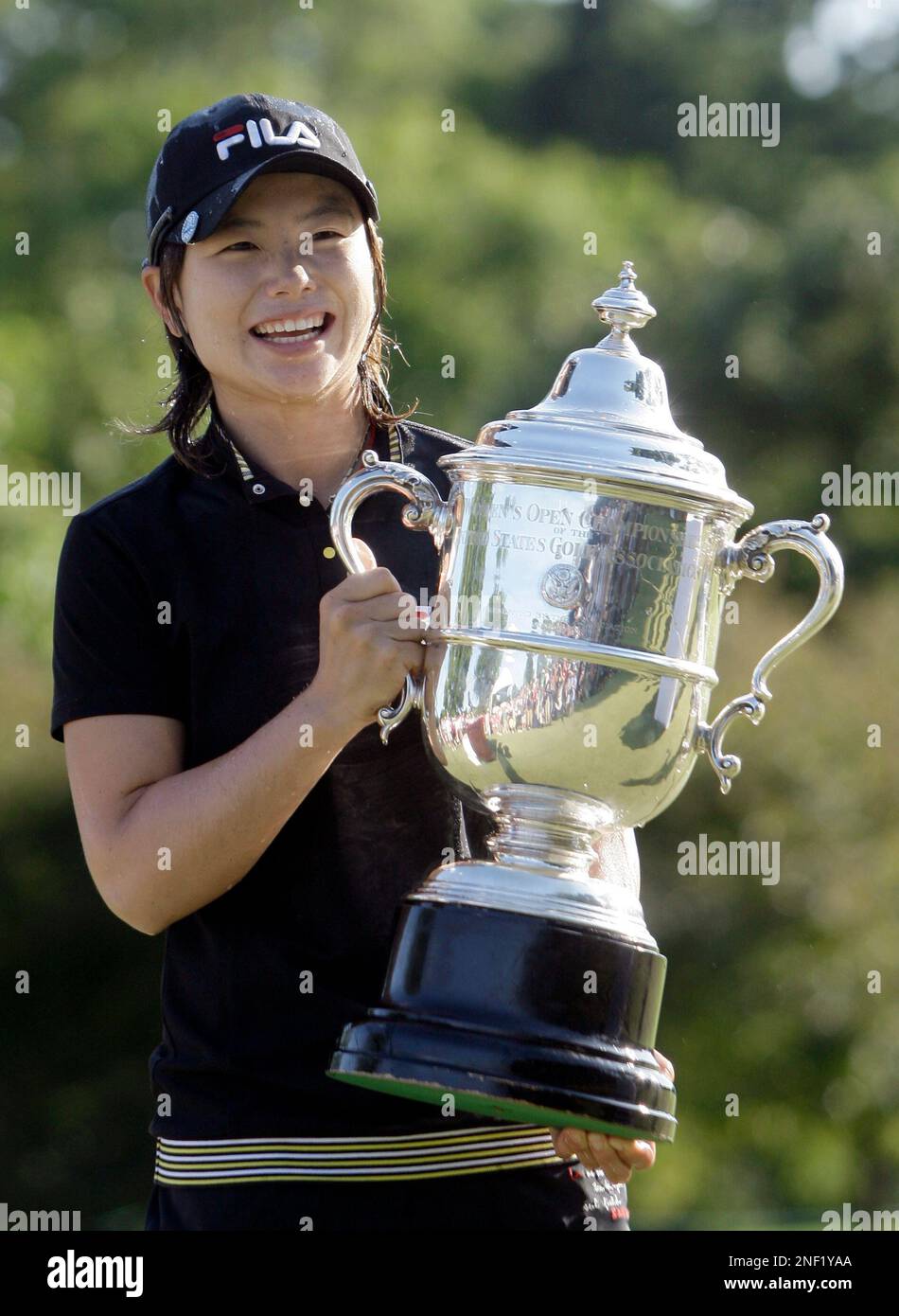 Eun Hee Ji of South Korea, holds the trophy after winning the U.S ...