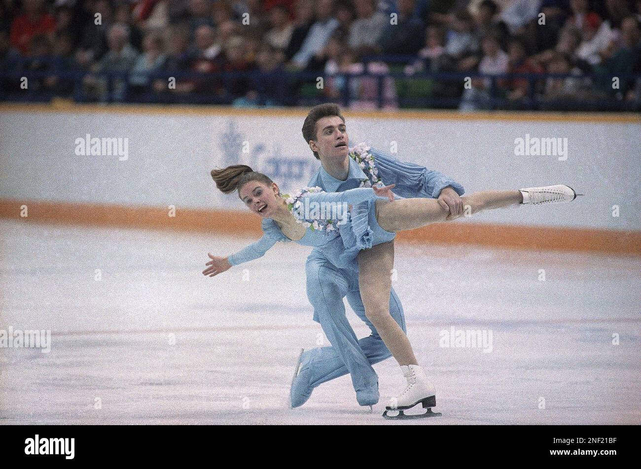 Ekaterina Gordeeva and Sergei Grinkov of the Soviet Union skate to the music on their way to ...
