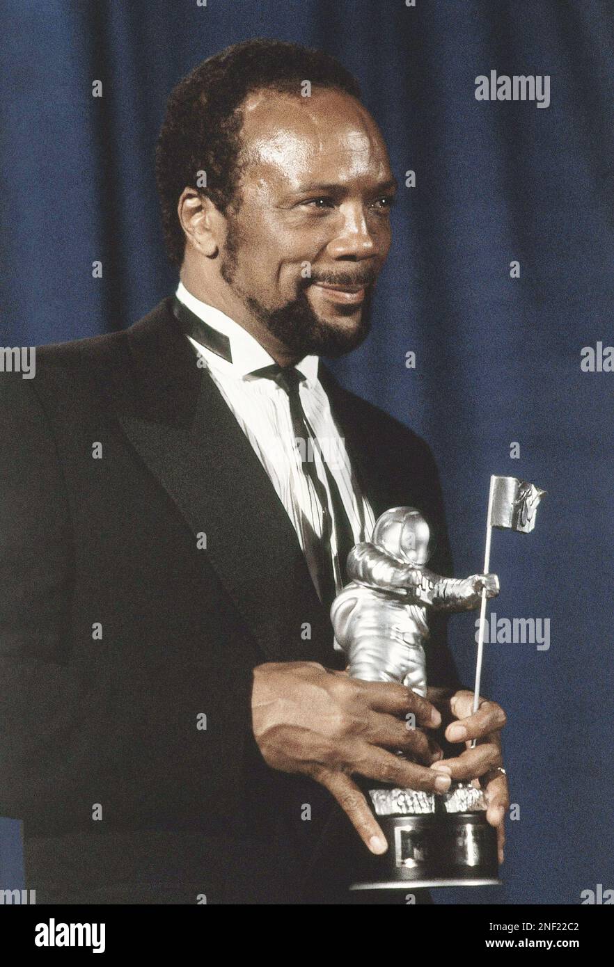 Quincy Jones, jazz musician and producer, holding special award at the ...