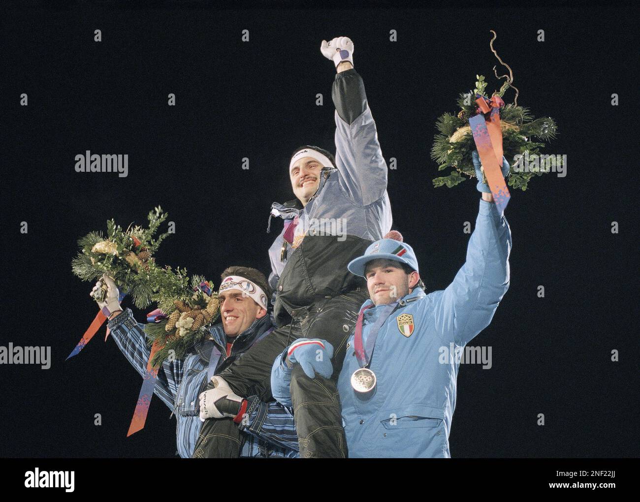 Men’s luge medal winners Markus Prock of Austria, silver, left, and ...