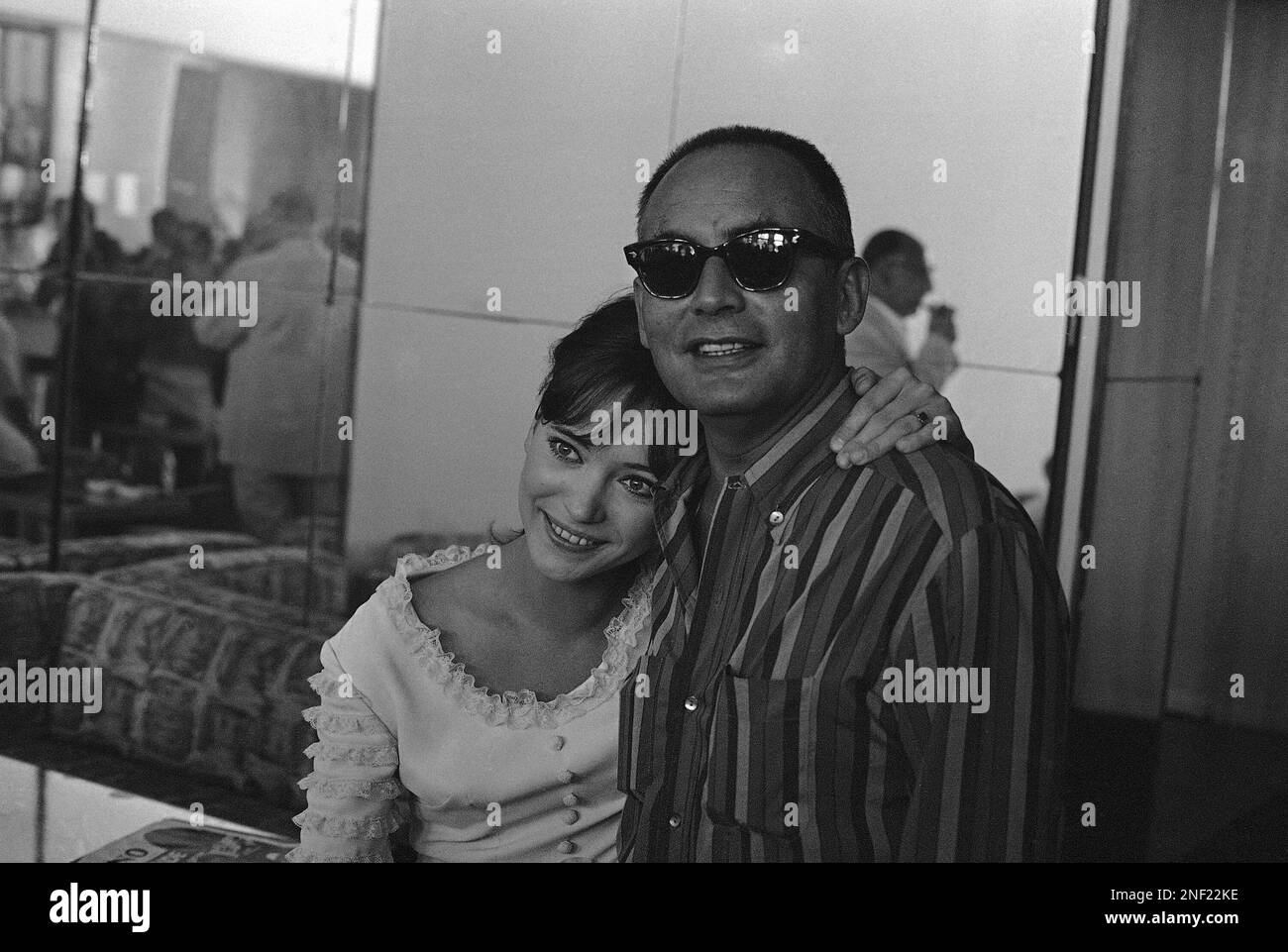 French actress Anna Karina embraces Italian producer Dino De Laurentiis ...