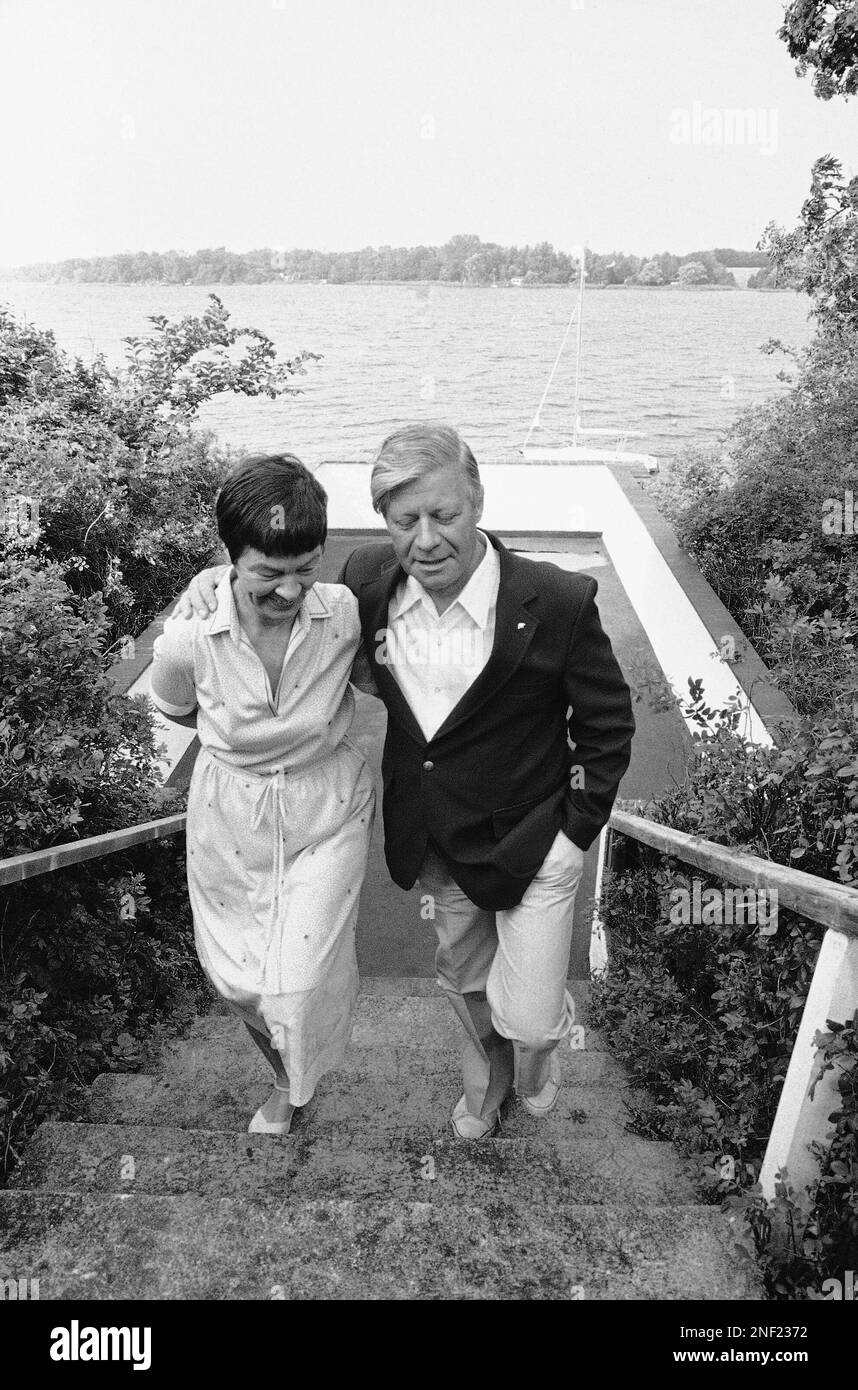 West German Chancellor Helmut Schmidt and his wife Hannelore walk ...