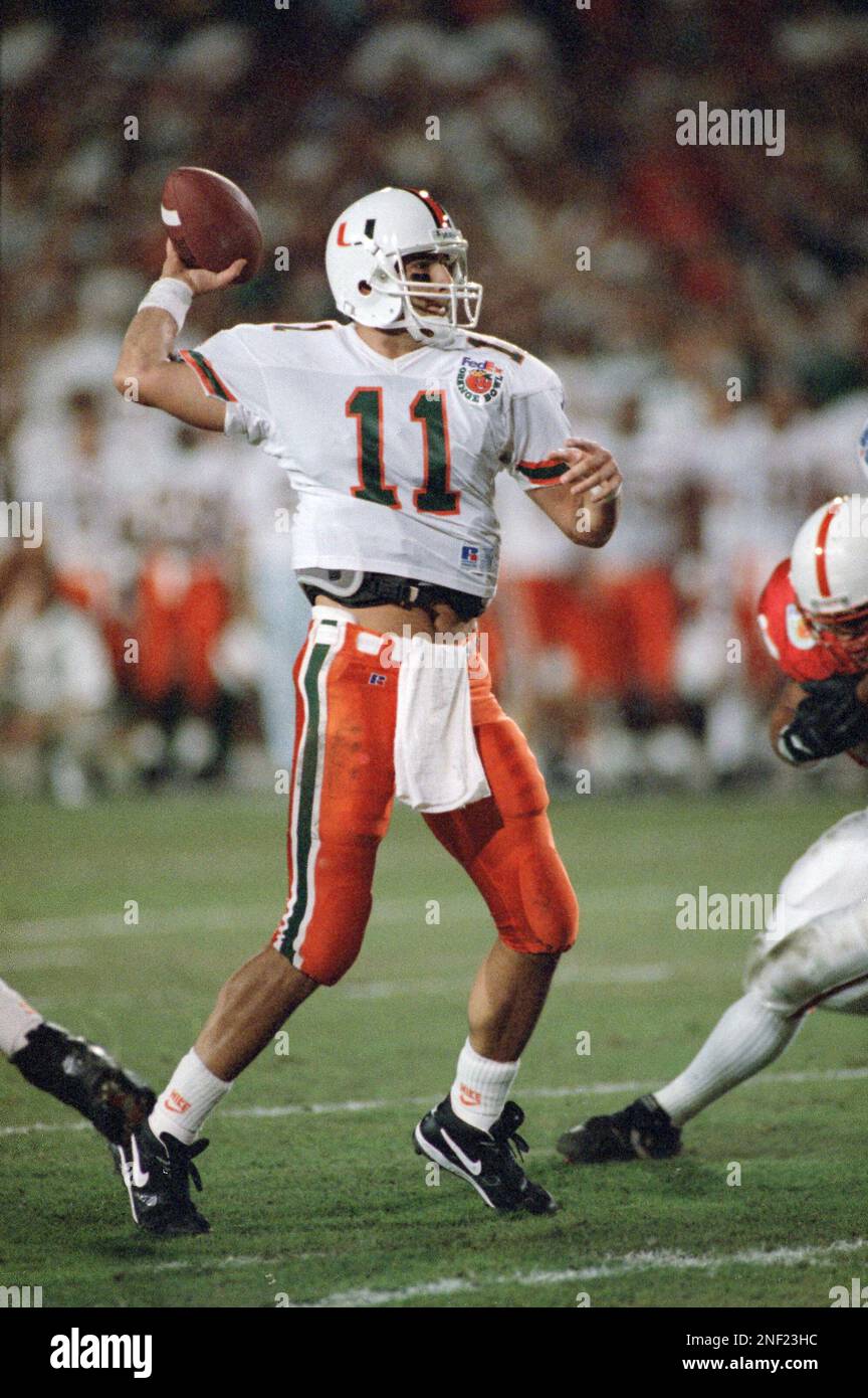Miami quarterback Frank Costa (11) passes during the first half against Nebraska at the FedEx ...