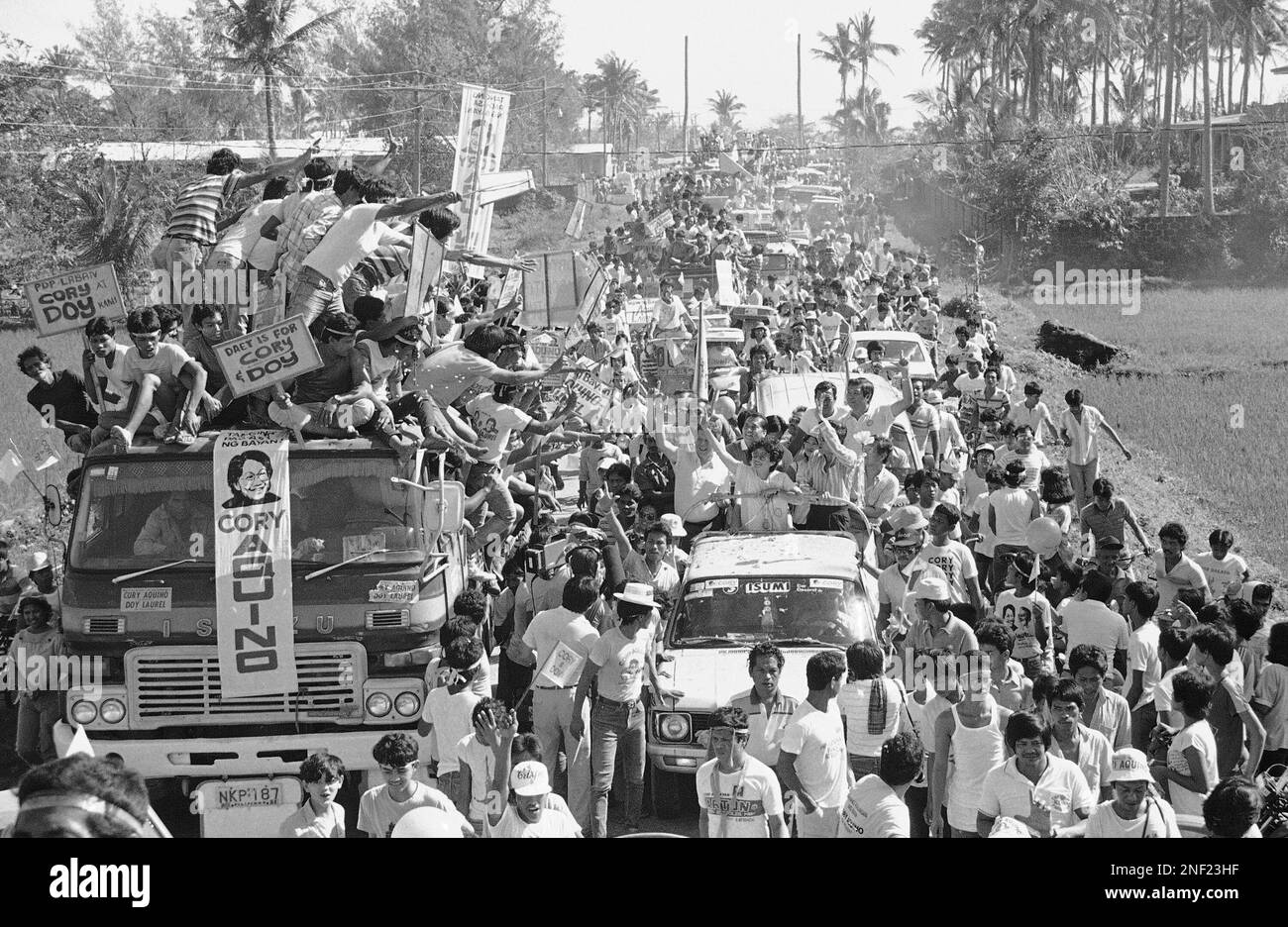 Opposition presidential candidate Corazon “Cory” Aquino (riding on an ...