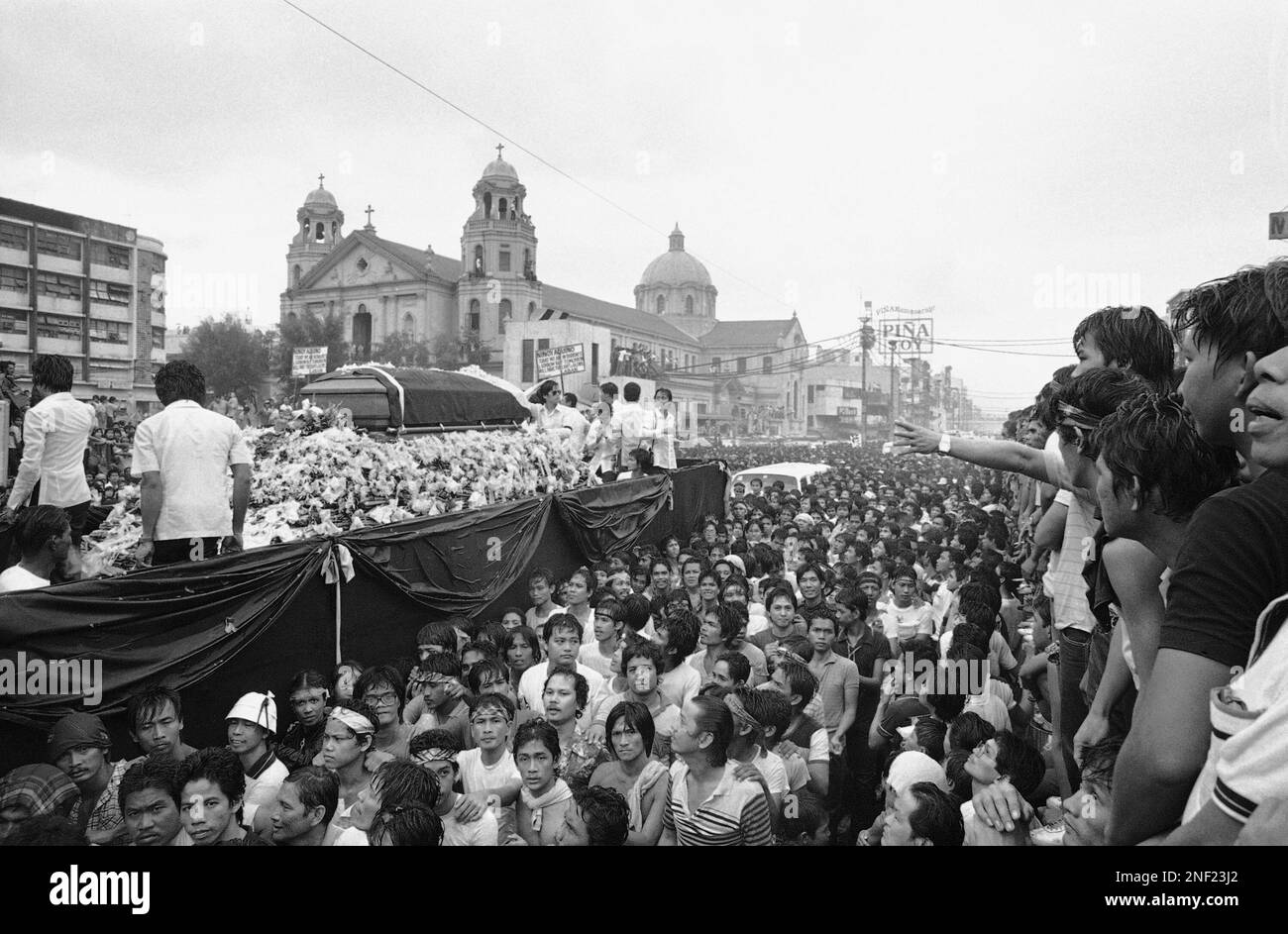 The truck carrying the body of slain former Senator Benigno Aquino ...