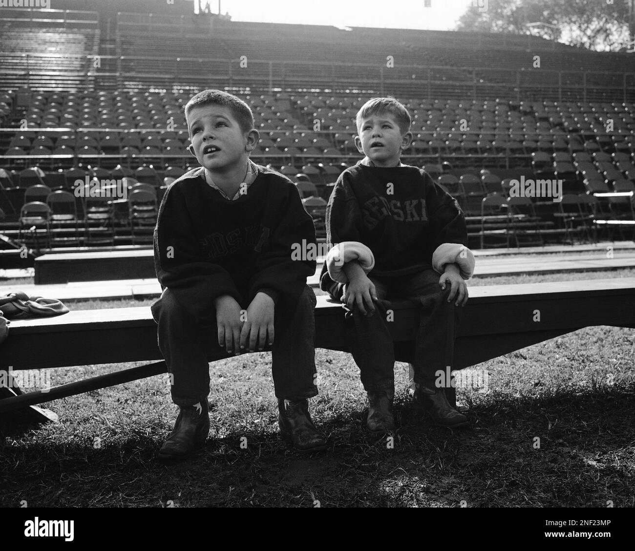 Sammy Baugh's son, Todd (left), eight, and David, six watch their dad ...