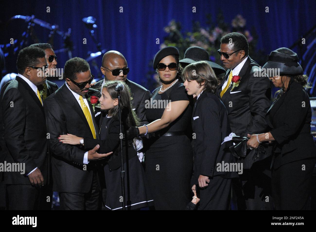 Paris Jackson is supported by her family after she speaks during the ...