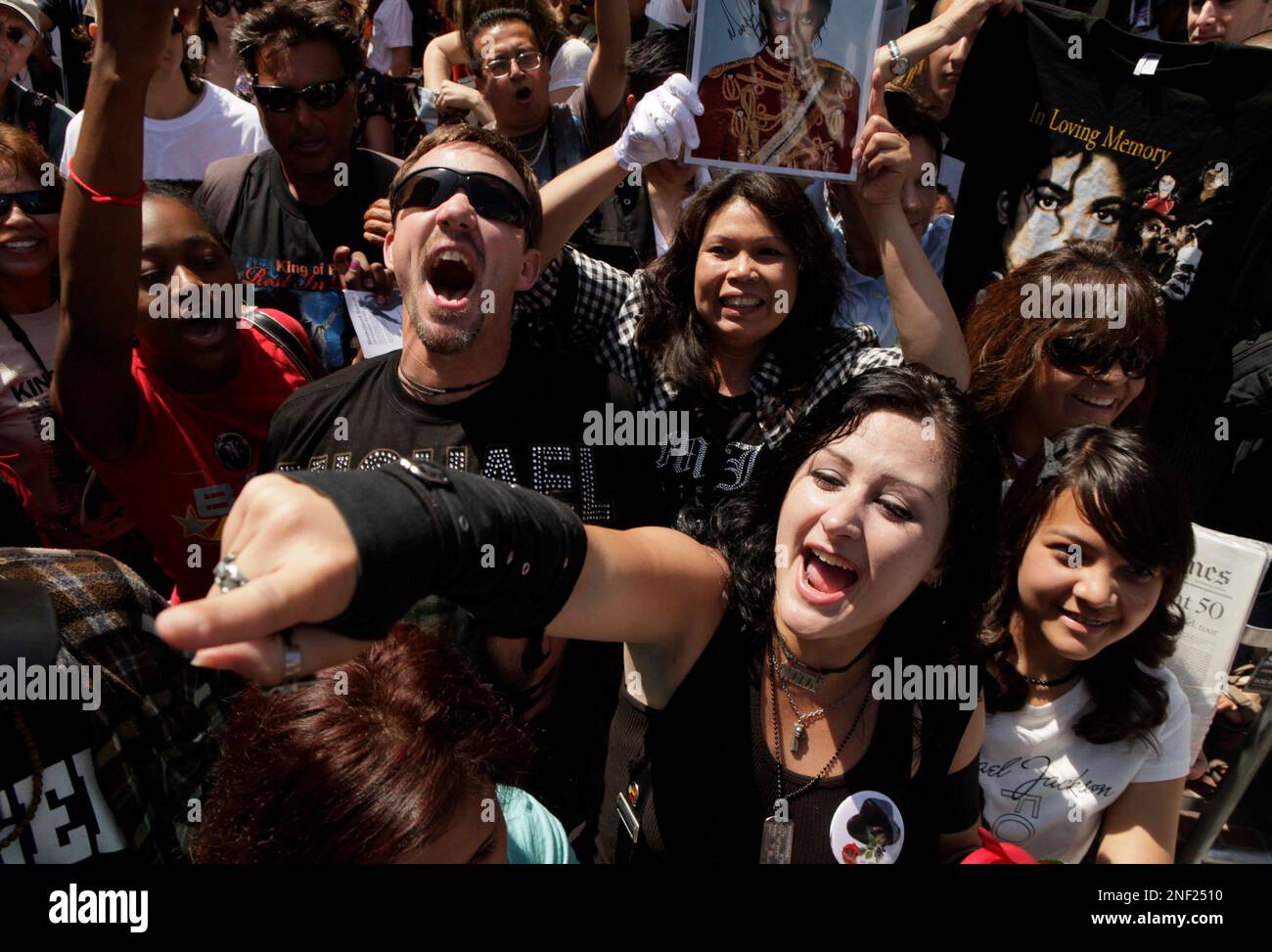 Inga Schuenemann, 27, of Riverside, Calif., bottom center, is seen with ...