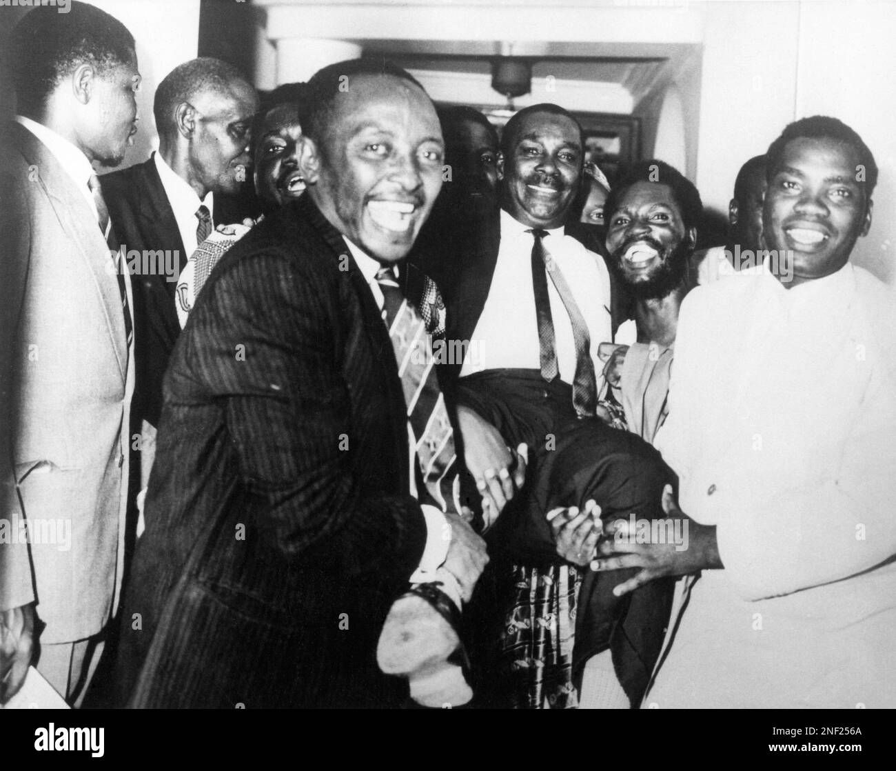 President Abeid Amani Karume of Zanzibar is carried shoulder high by ...