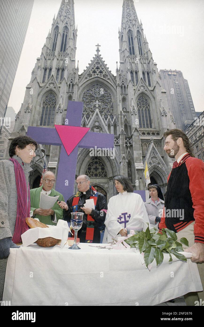 Roman Catholic priests Bill O’Brien, of New York, second from left, and ...