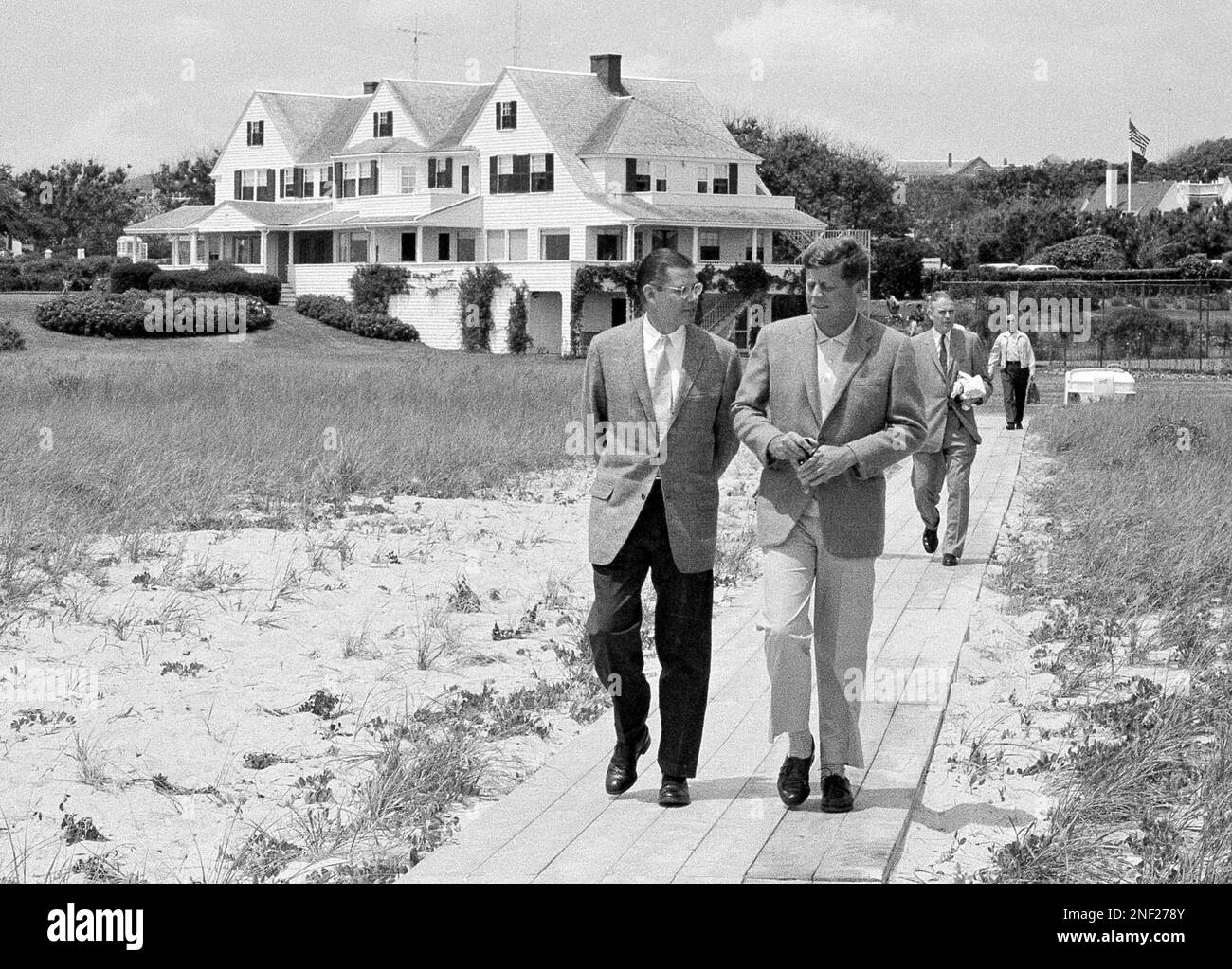 FILE - In a July 8, 1961 file photo, President John Kennedy, right ...