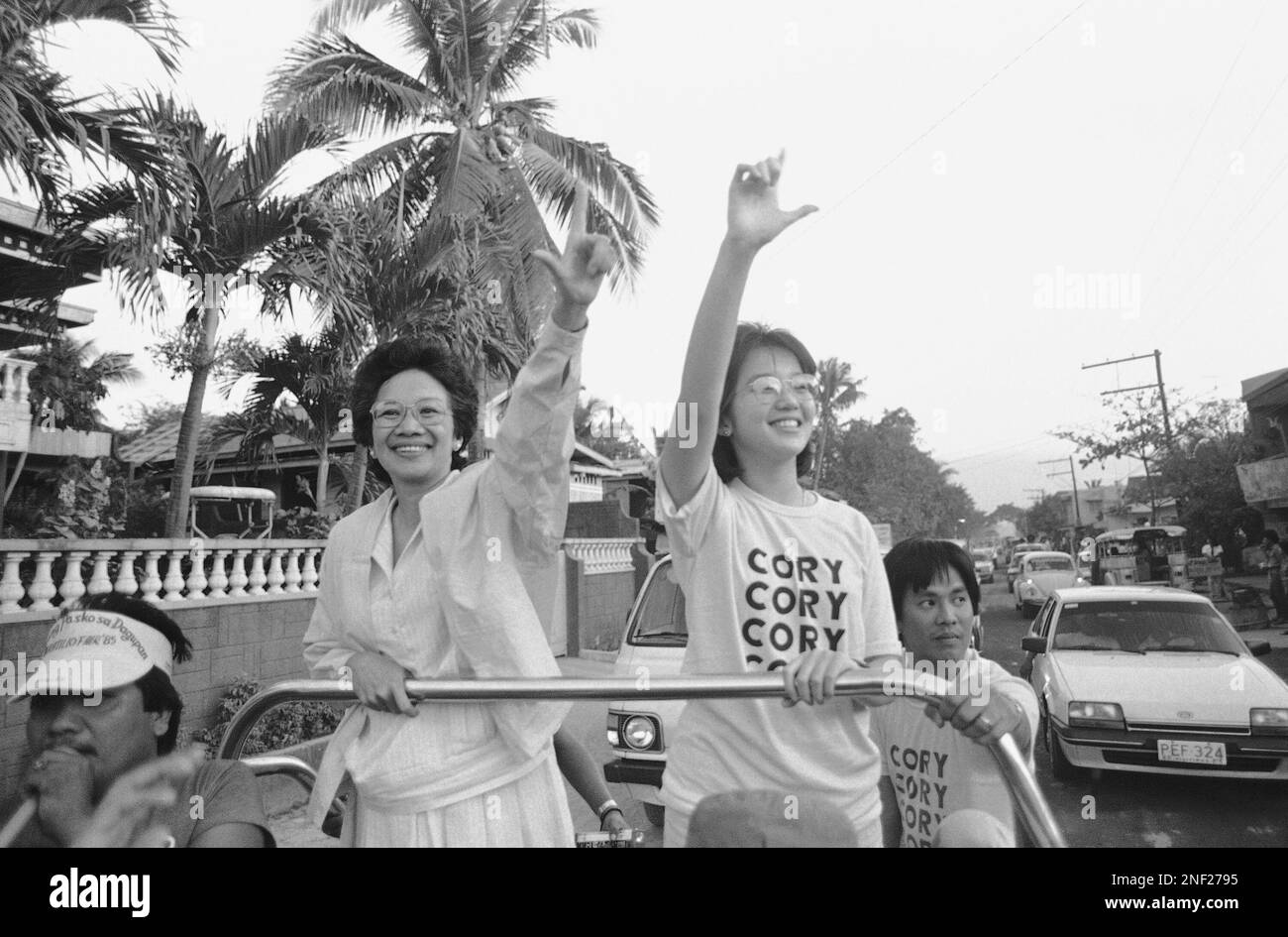 Opposition presidential candidate Corazon Aquino, left, and her ...