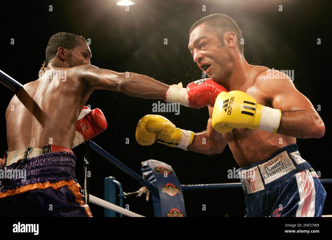 Panama's boxer Anselmo Moreno, left, lands a right against France's ...