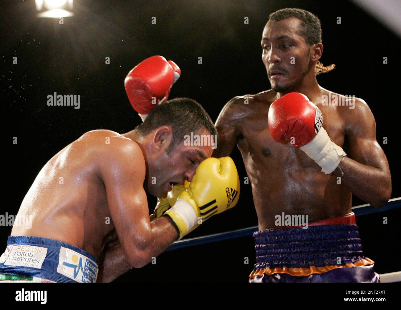 Panama's Anselmo Moreno, right, lands a right against France's Mahyar ...