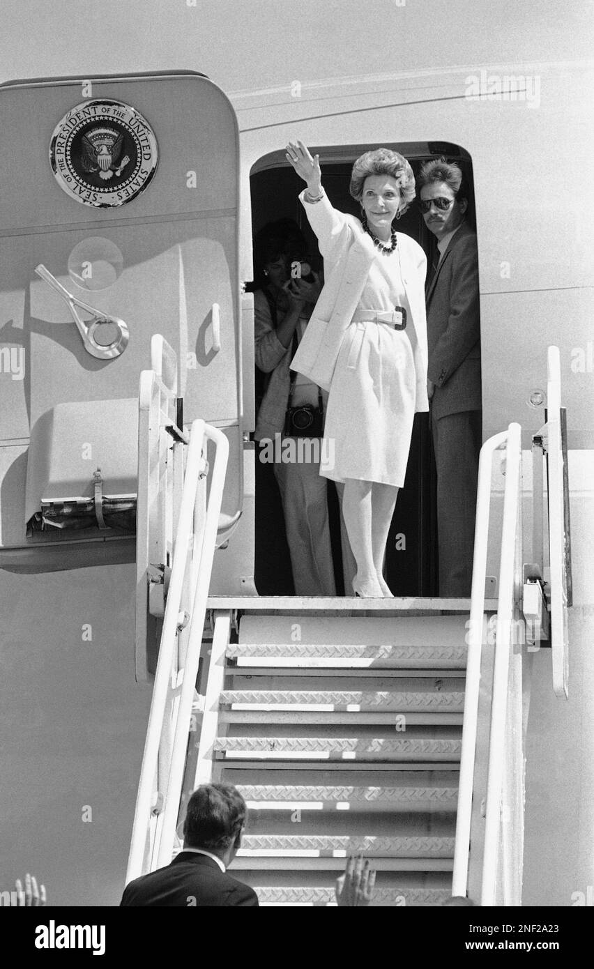 U.S. First Lady Nancy Reagan waves from the door of a U.S. Air Force ...