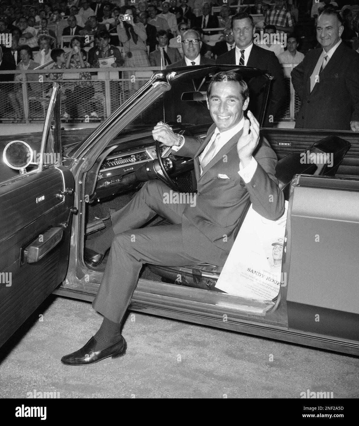 Sandy Koufax sits in his Chrysler Newport at Shea Stadium, Sept. 18 ...