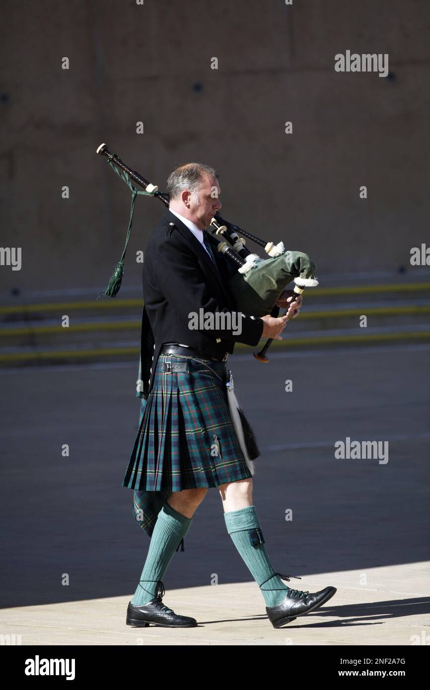 A bagpiper arrives at the funeral of Farrah Fawcett on Tuesday June 30 ...