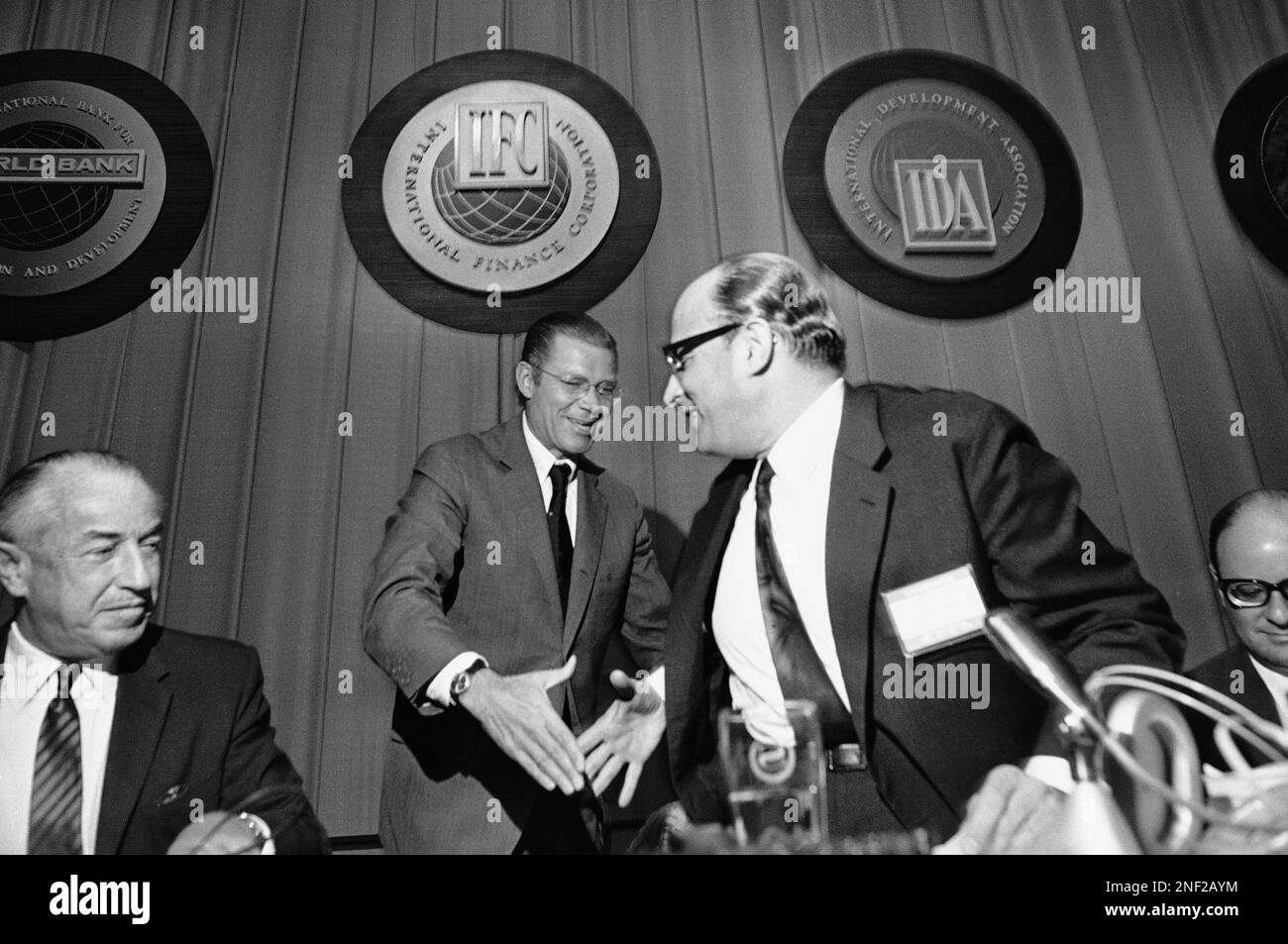 Robert S. McNamara, president of the World Bank, shakes hands with ...
