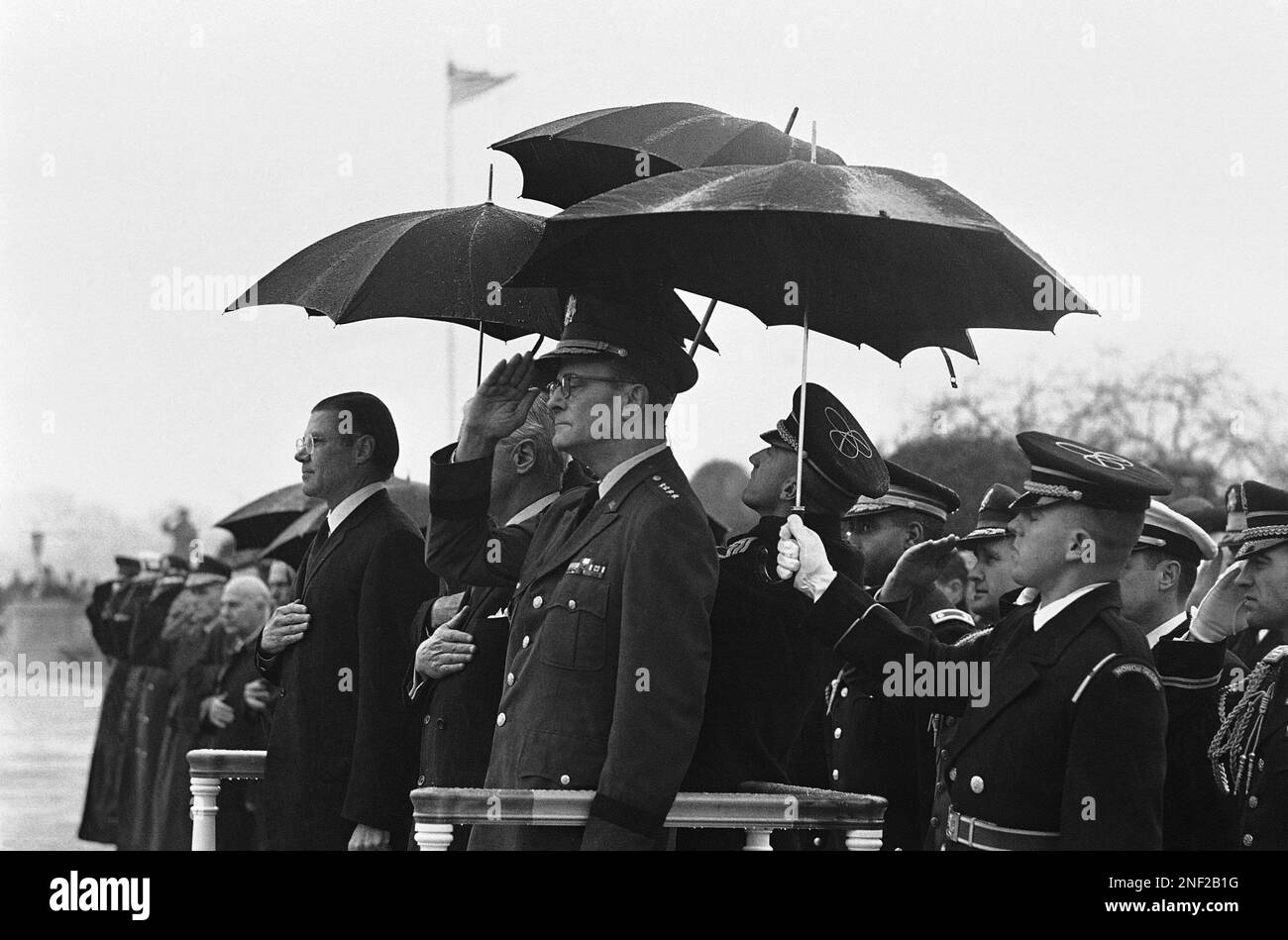 Robert McNamara, retiring Secretary of Defense, gives a final wave at a ...