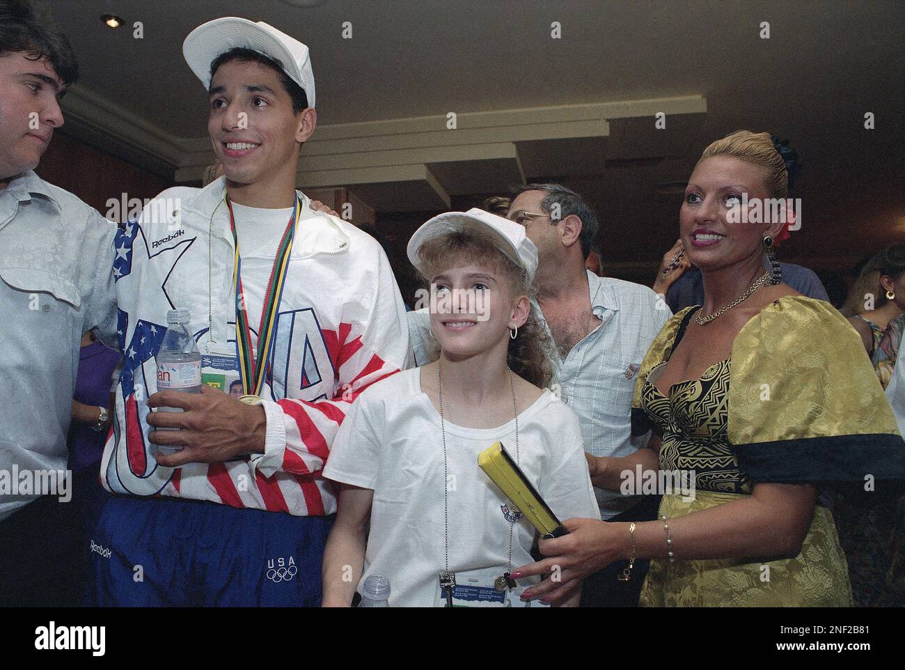 U.S. Olympic medalist Trent Dima of Alberquerque, N.M., left, who won a ...