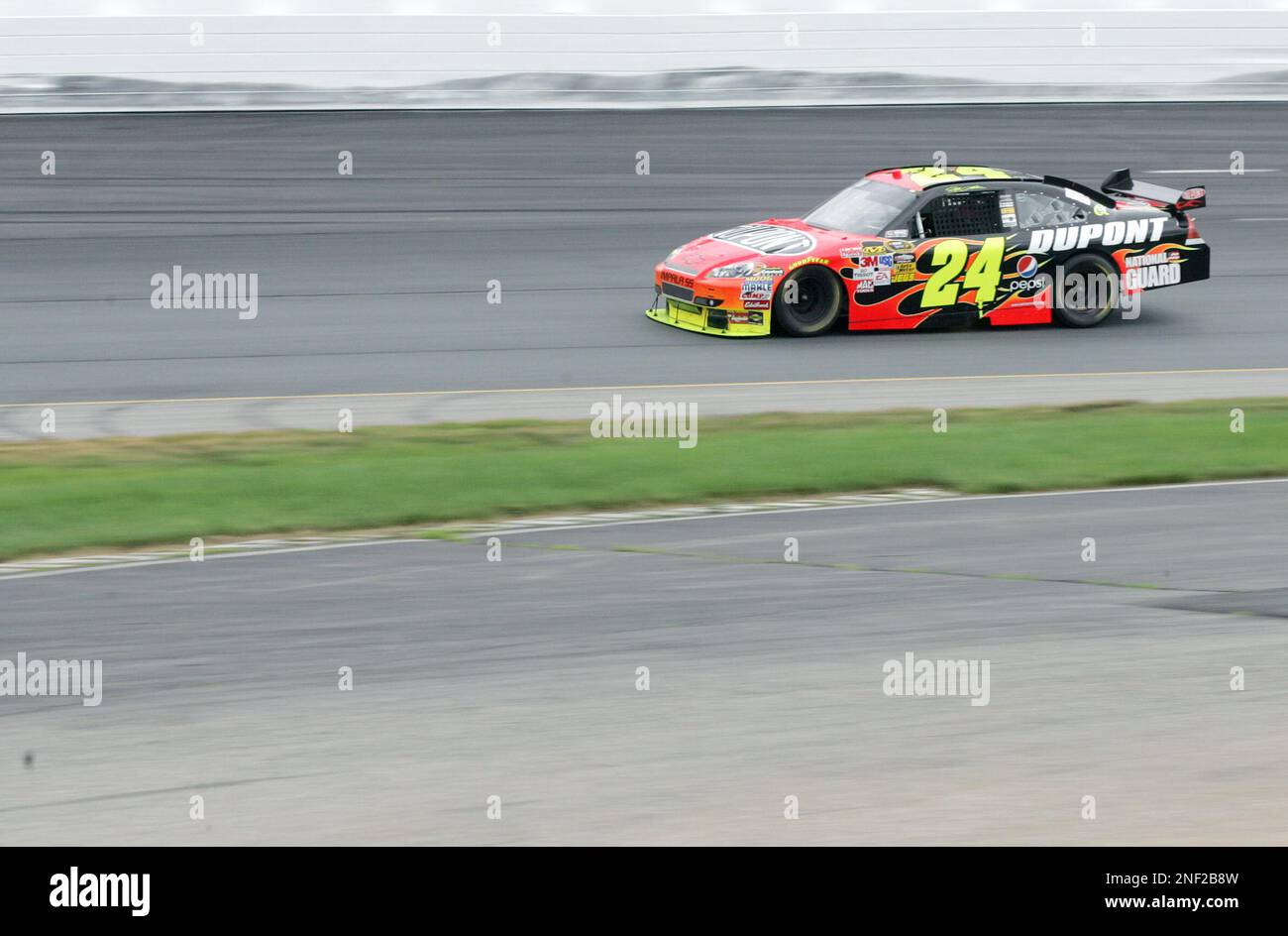 Jeff Gordon (24) races through turns 3 and 4 during the NASCAR Lenox ...