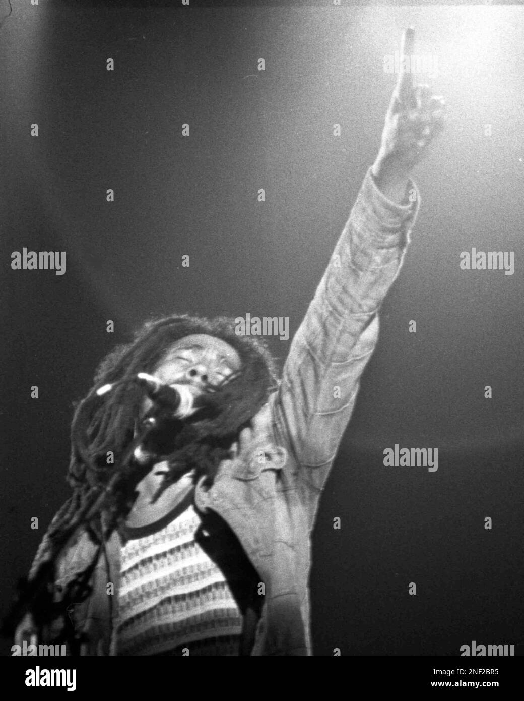 Jamaican Reggae singer Bob Marley performs in front of an audience of ...