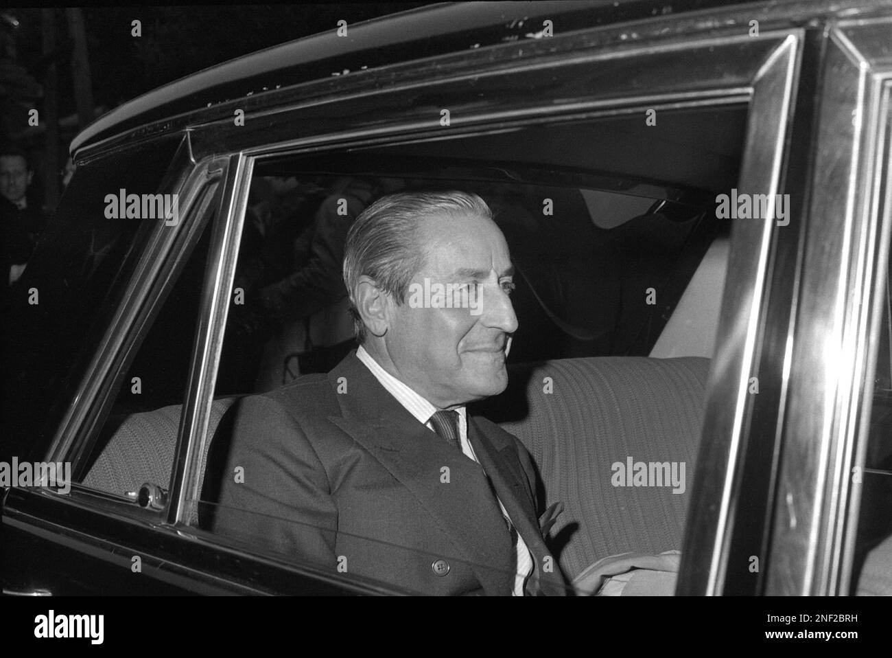 Greek shipping magnate Stavros Niarchos leaves the villa of Prince ...