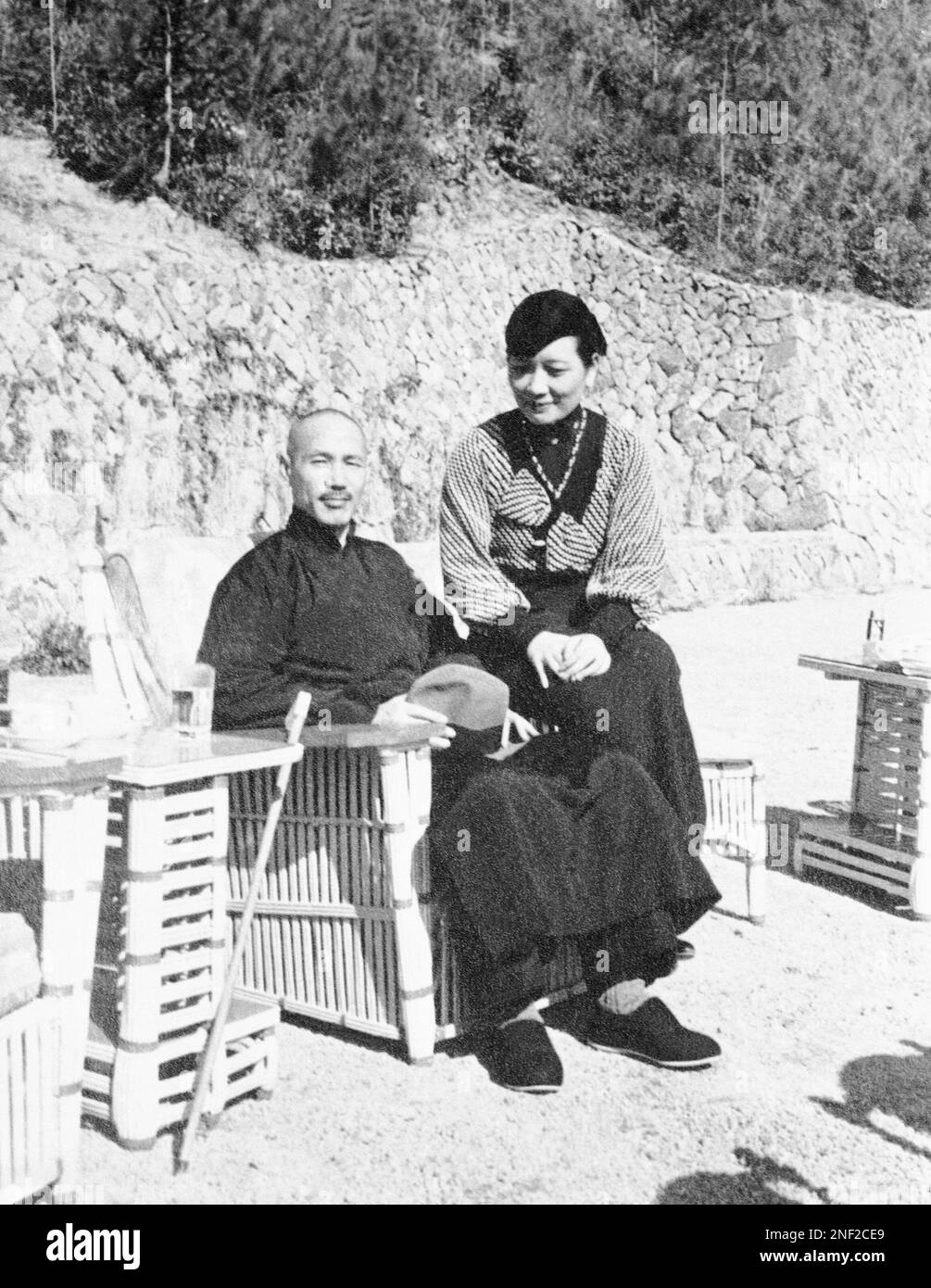 Chiang Kai-Shek is shown with wife, Mme. Chiang Kai-Shek, also known as ...