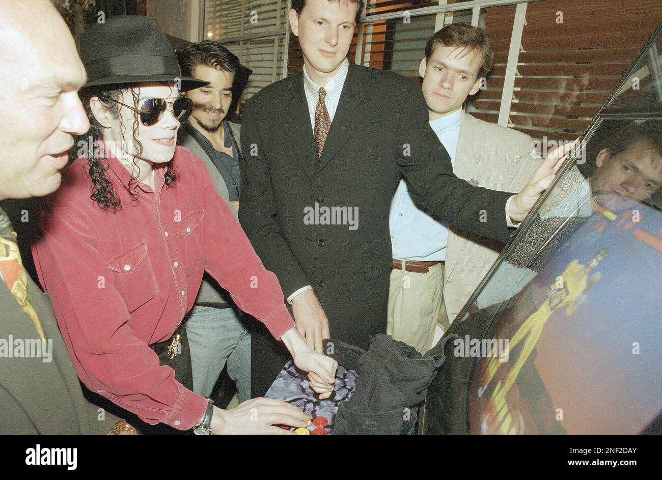Michael Jackson gets a thrill as he plays Sony’s new video game system ...