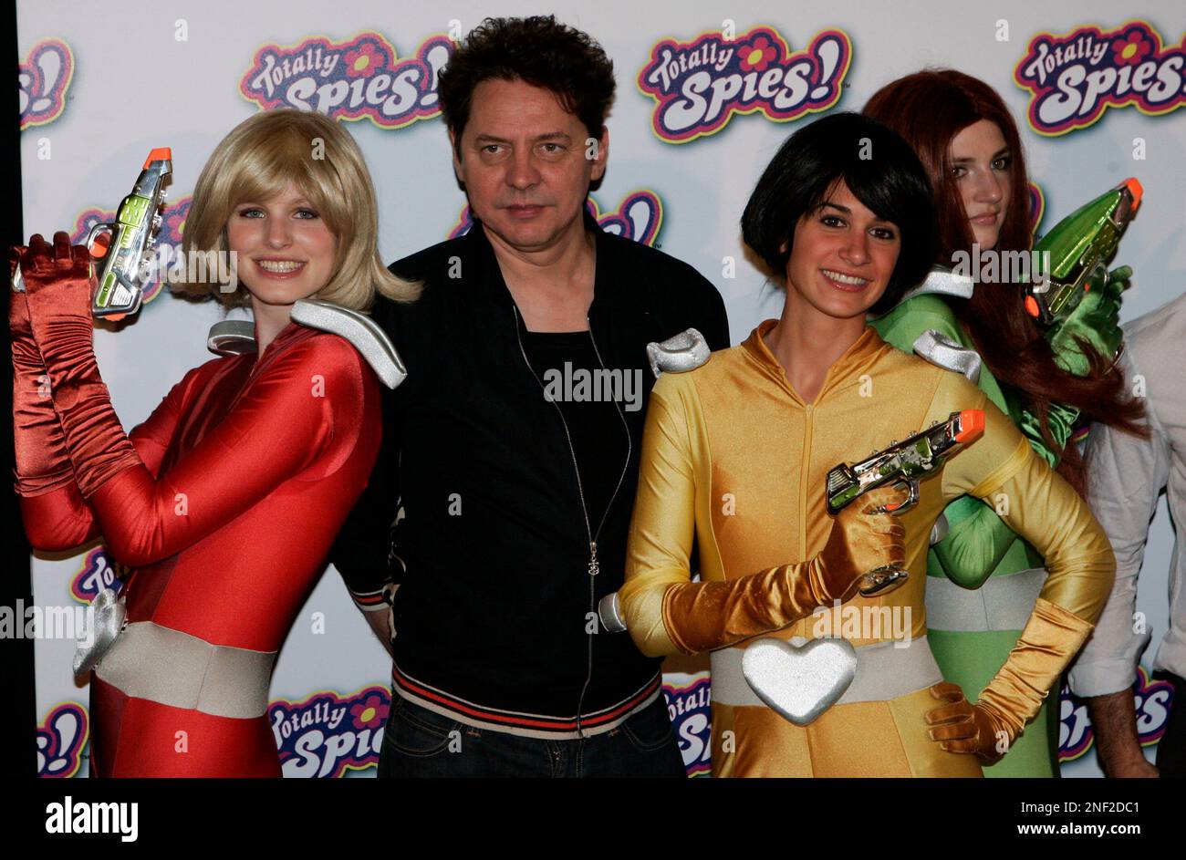 French Director Pascal Jardin, second left, stands with spies ...