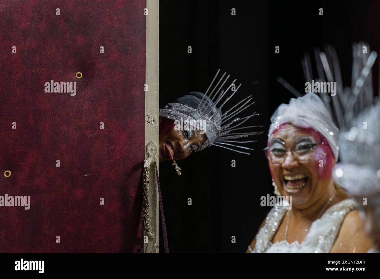 Candombe dancers laugh as they get ready to perform in "Las llamadas ...