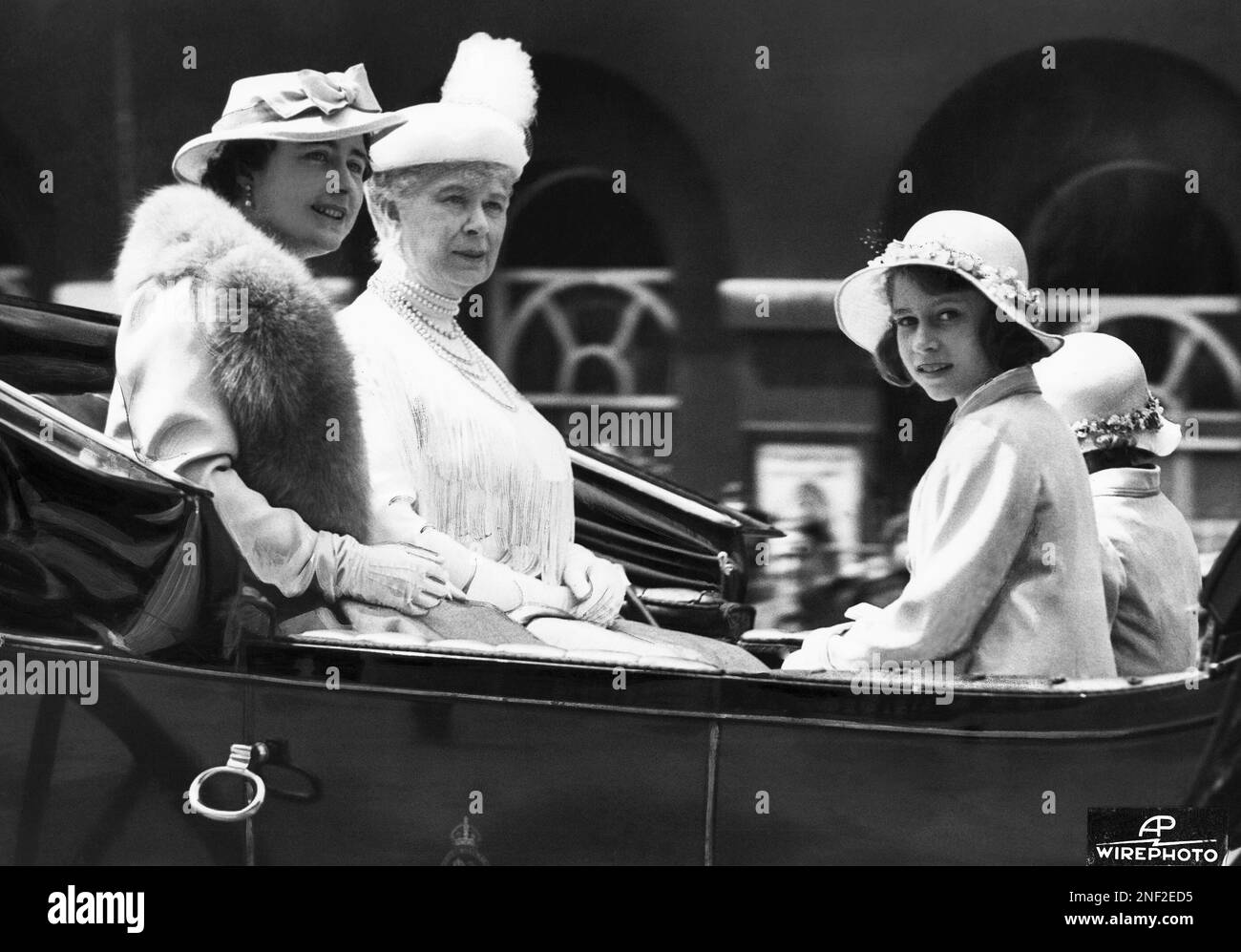 Queen Elizabeth and Dowager Queen Mary are shown as they rode to ...